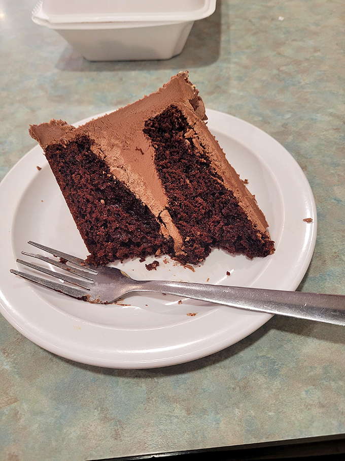 Chocolate cake so rich it probably has its own accountant. That perfect frosting-to-cake ratio is what dreams are made of.