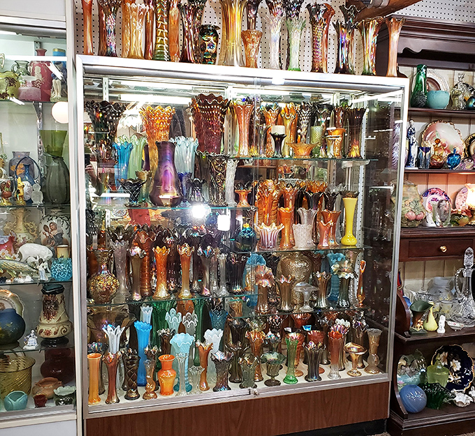 Carnival glass heaven&mdash;where your grandmother's prized possessions multiply like rabbits in a display case of shimmering, iridescent glory.