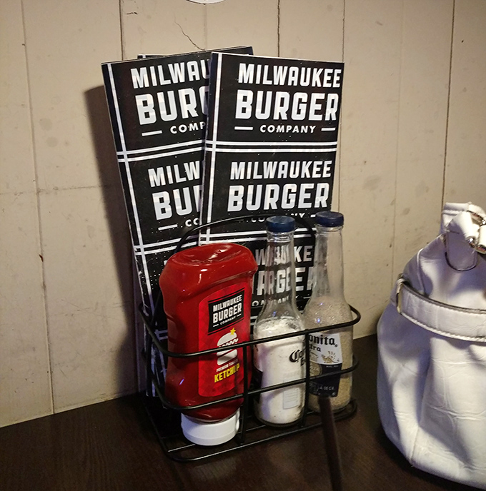 Table condiments arranged with the care and precision usually reserved for museum displays&mdash;because proper sauce application is serious business.
