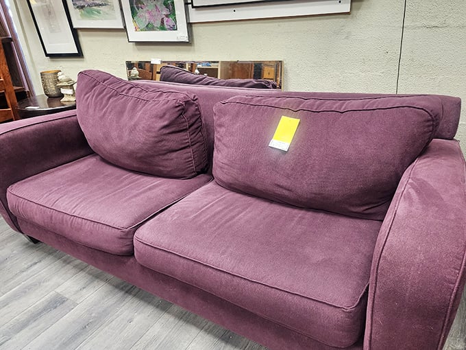 This plum-colored sofa isn't just furniture&mdash;it's a mood. Its rich hue and plush cushions invite you to sink in with a good book and completely forget about your to-do list.