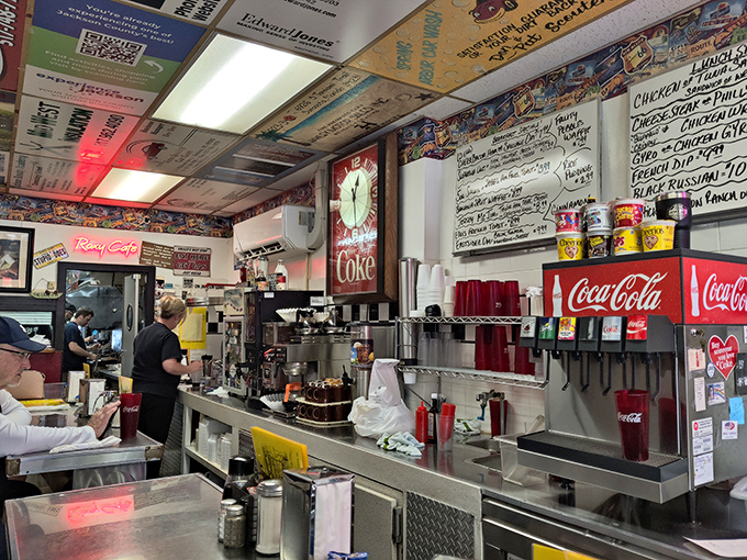 The command center where coffee flows like conversation and red cups stand ready for refills. This counter has witnessed more town gossip than the local barber shop.