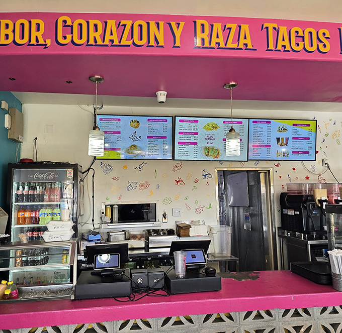 Behind this counter, culinary magic happens daily. The pink and turquoise color scheme hints at the flavor fiesta that awaits.