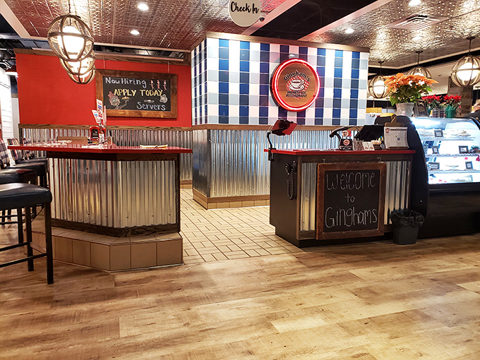 The welcome station: where hungry strangers become regulars and regulars become family. That corrugated metal wainscoting adds just the right touch of farmhouse chic.