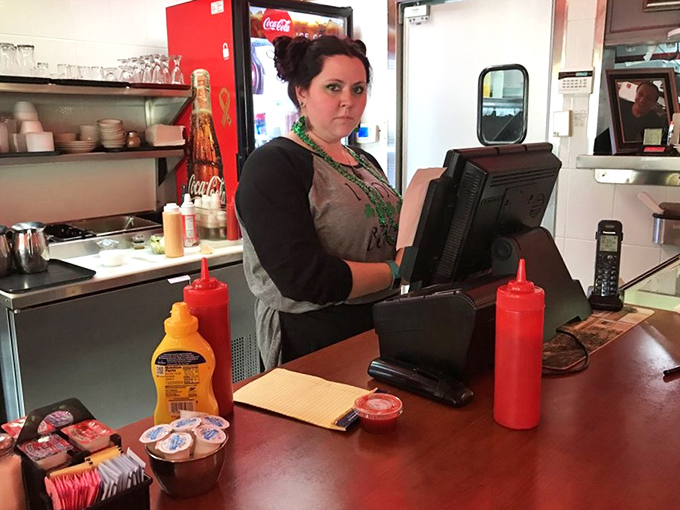 Where the magic happens &ndash; condiment bottles standing at attention like soldiers guarding the gateway to flavor country. Respect the squeeze.