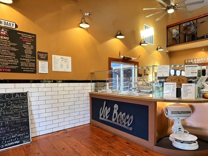 The ordering counter: where dreams are placed and trays of smoky goodness are born. That chalkboard of specials is basically a love letter.