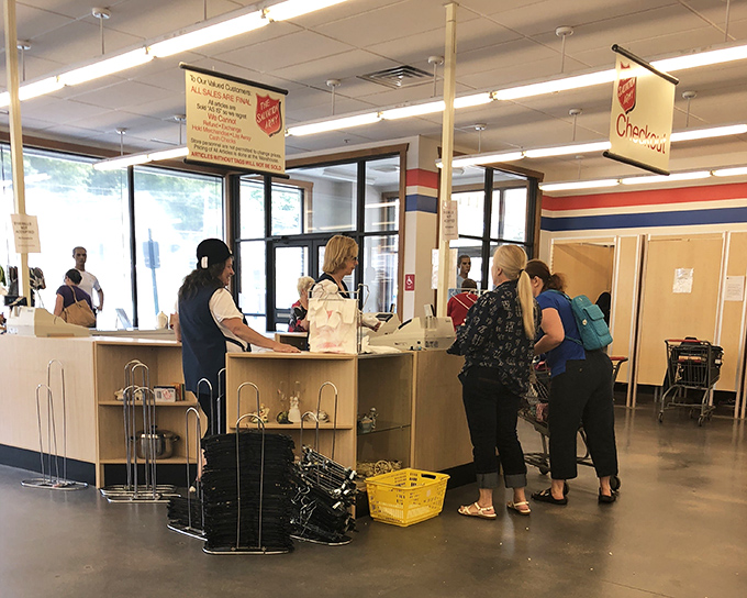 The checkout counter &ndash; final gateway between browsing and bringing treasures home. Friendly staff make the transition from "just looking" to "sold" seamless.