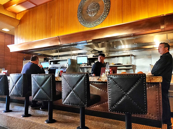 Counter dining&mdash;where solo diners become part of the kitchen's rhythm and regulars exchange knowing nods about what to order.