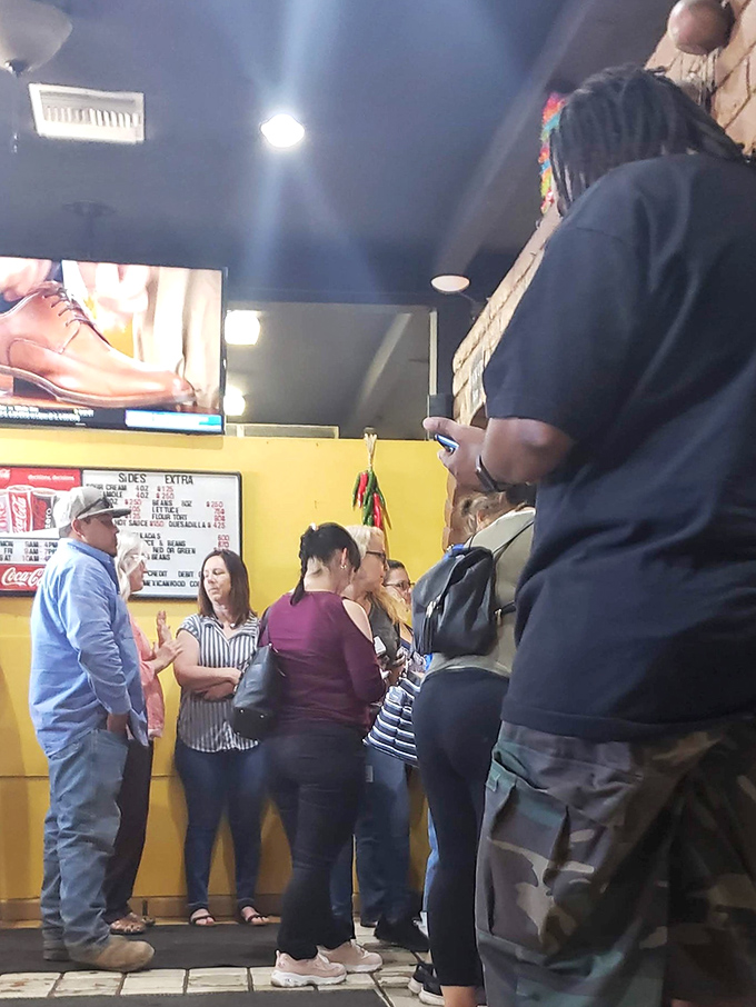 The line forms for a reason. These patrons aren't just waiting for food; they're queuing for an experience that's become a Phoenix tradition.