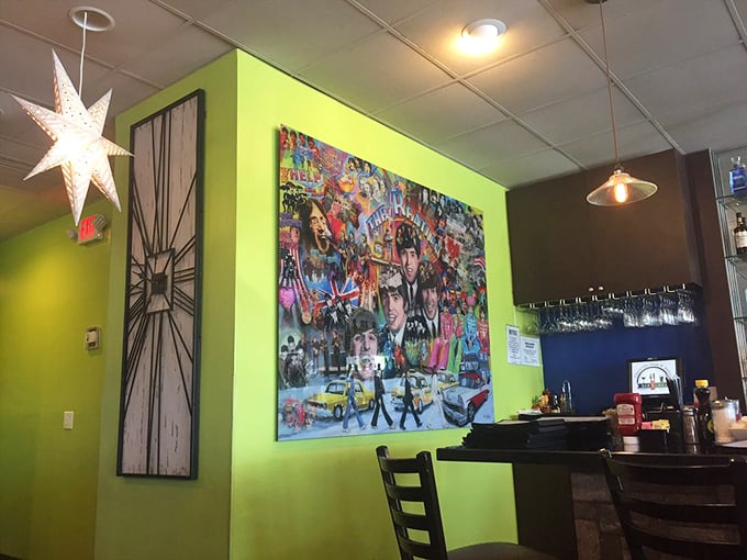 Vibrant walls and eclectic art create a space that's equal parts diner and local hangout. The Beatles-inspired collage suggests your taste in breakfast should be just as legendary.