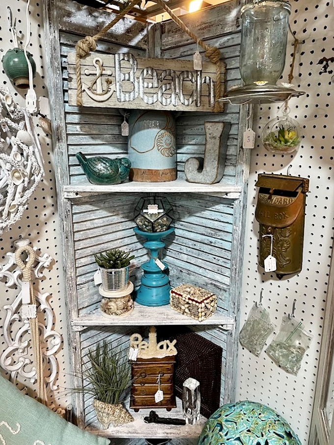 Coastal-themed corner brings beachy vibes with weathered wood, aqua accents, and nautical touches. Florida's shoreline spirit captured in carefully curated vignettes.