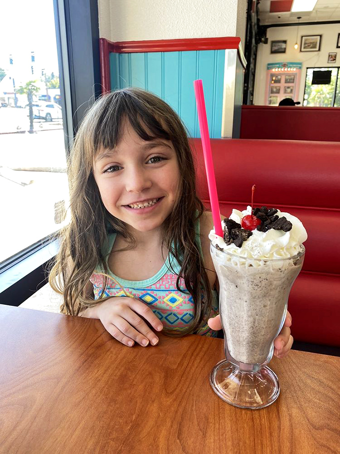 The diner experience is meant to be shared across generations. That milkshake is creating a core memory that will last longer than the brain freeze.