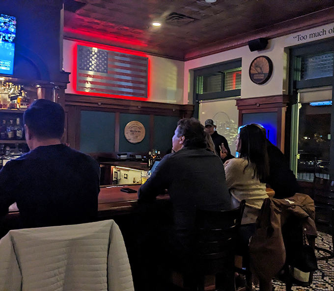 Evening at Oak transforms the space into a warm sanctuary where the illuminated American flag reminds you that great food is truly patriotic.