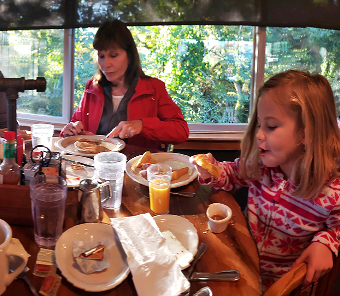 Families gathering around tables laden with breakfast bounty &ndash; creating memories one pancake stack at a time. The true magic of places like Hank's.