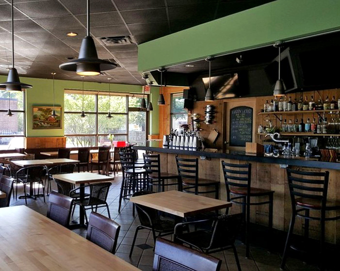 The dining area balances modern restaurant with cultural warmth. Like your stylish friend's apartment that always makes you feel at home.