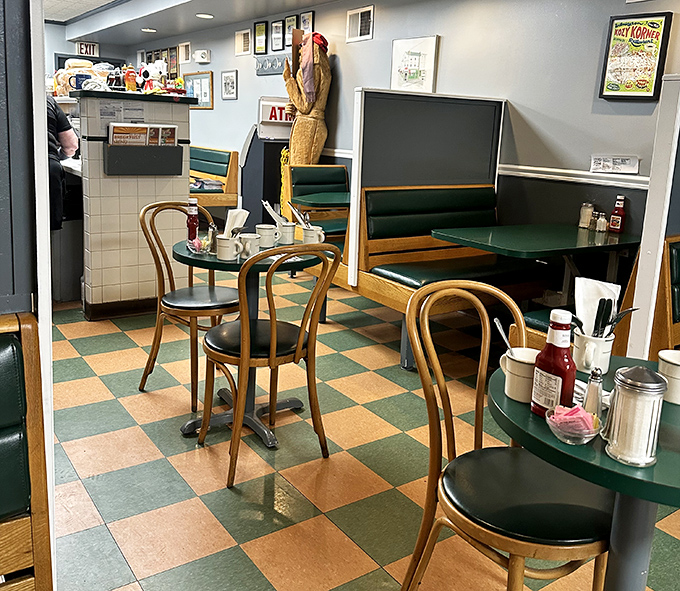 Classic bentwood chairs and green tables &ndash; the furniture equivalent of a warm hug from your favorite aunt who always has cookies ready.