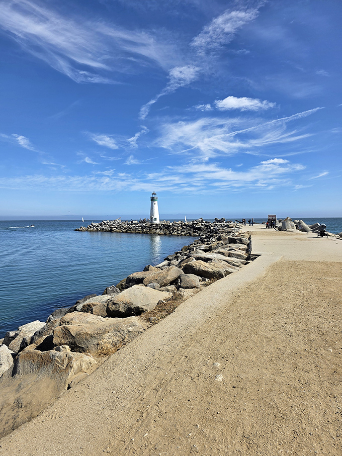 Under impossibly blue California skies, the lighthouse stands as a reminder that sometimes the best attractions don't have gift shops or admission fees.