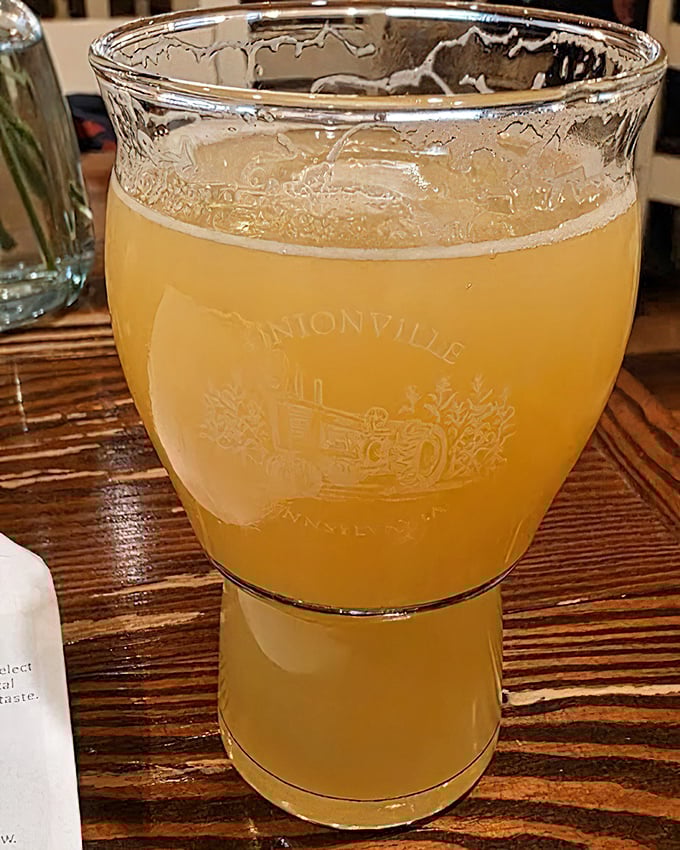 A golden elixir in a glass that catches the light like liquid sunshine. This isn't just a beverage&mdash;it's a pause button for life's hectic pace.