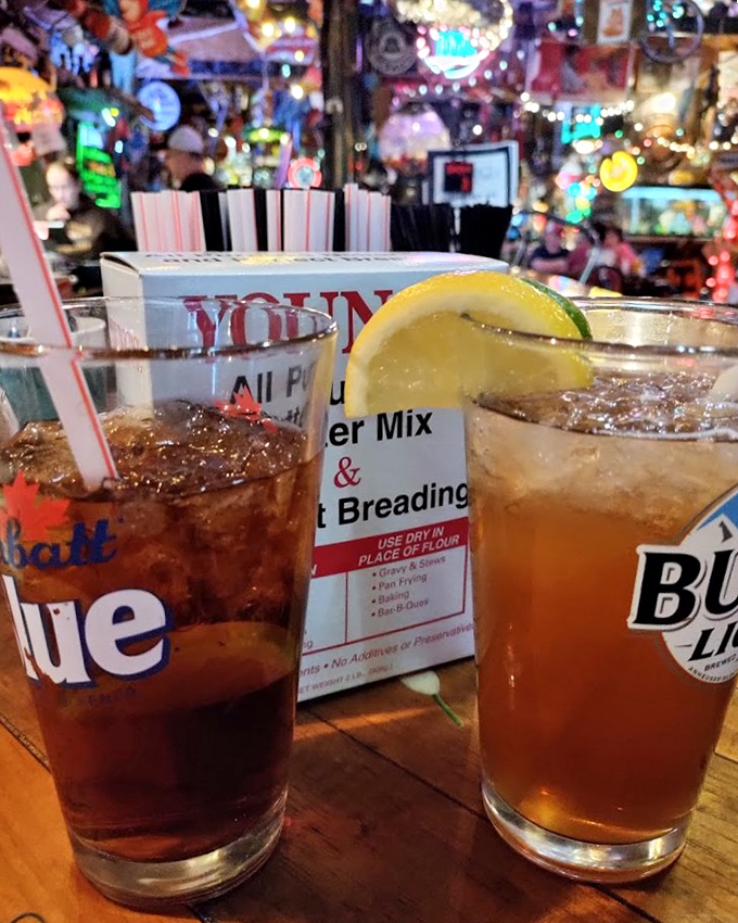 Cold drinks at a well-worn bar—the perfect companions for stories that get better with each telling and every sip.