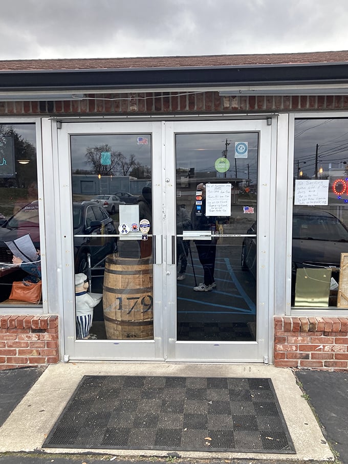 The entrance features a charming wooden barrel&mdash;a hint at the no-frills, unpretentious treasure trove of comfort food waiting inside.