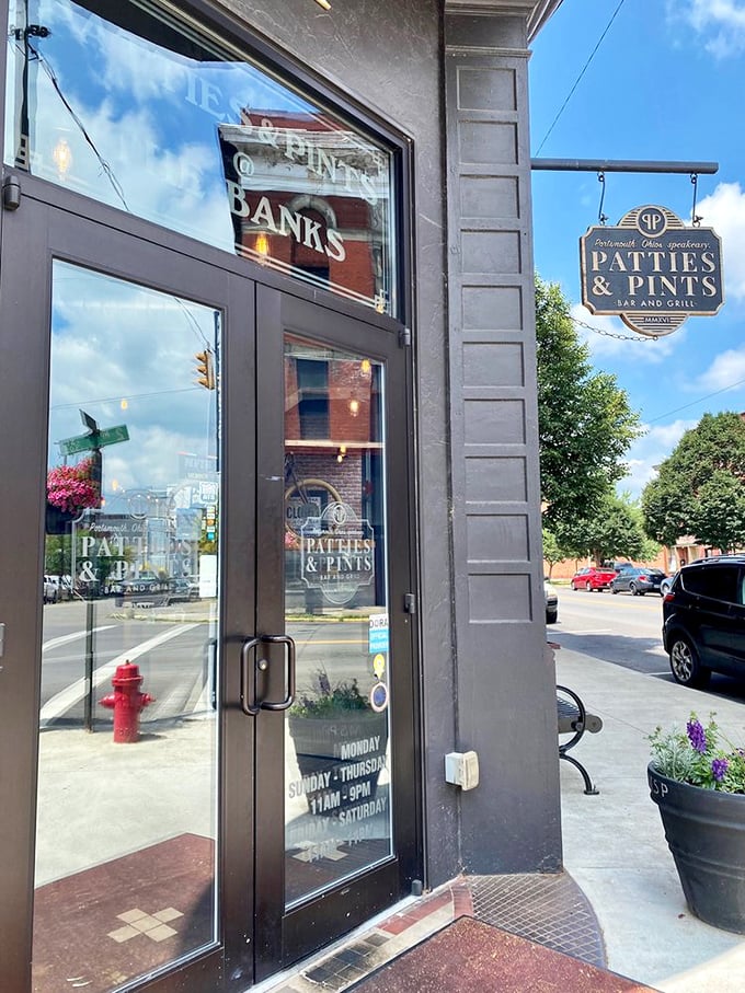 The entrance that separates ordinary days from extraordinary meals. That hanging sign is like a beacon of hope for the hungry and thirsty alike.