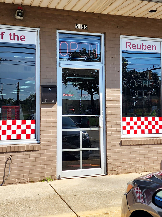 The entrance to sandwich nirvana. That red and white checkerboard trim is like the starting flag at a deliciousness race.