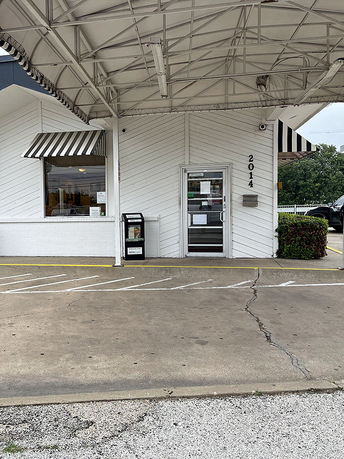 The entrance&mdash;humble, unassuming, and numbered&mdash;like the doorway to a secret club where the password is "hungry."