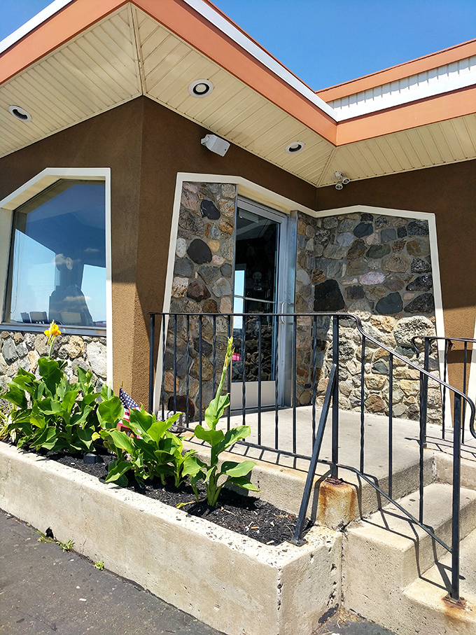 The entrance with its stone facade and planters says "Welcome to comfort" without saying a word. Your diet plan, however, is saying "Goodbye."
