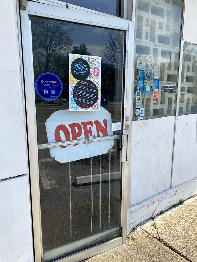 The "OPEN" sign&mdash;possibly the most beautiful word in the English language when it's hanging on the door of a legendary barbecue joint.