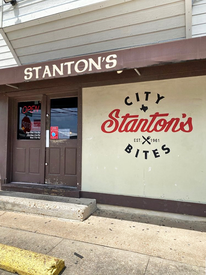 The entrance to Stanton's doesn't whisper&mdash;it announces itself with confidence. That "OPEN" sign might be the best news you'll get all day.