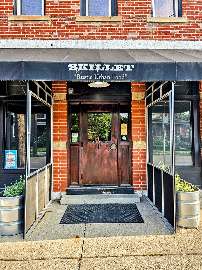 The dining room's industrial-chic vibe creates the perfect backdrop for serious eating. Those metal chairs have witnessed countless food epiphanies.