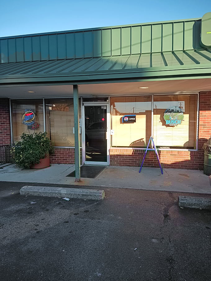 The welcoming entrance promises comfort food paradise within, like a portal to a dimension where calories don't count and pizza is always the right answer.