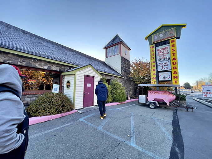 The entrance beckons like a siren song of smoked meats, with that pink trim serving as nature's way of saying, "Good food happens here."