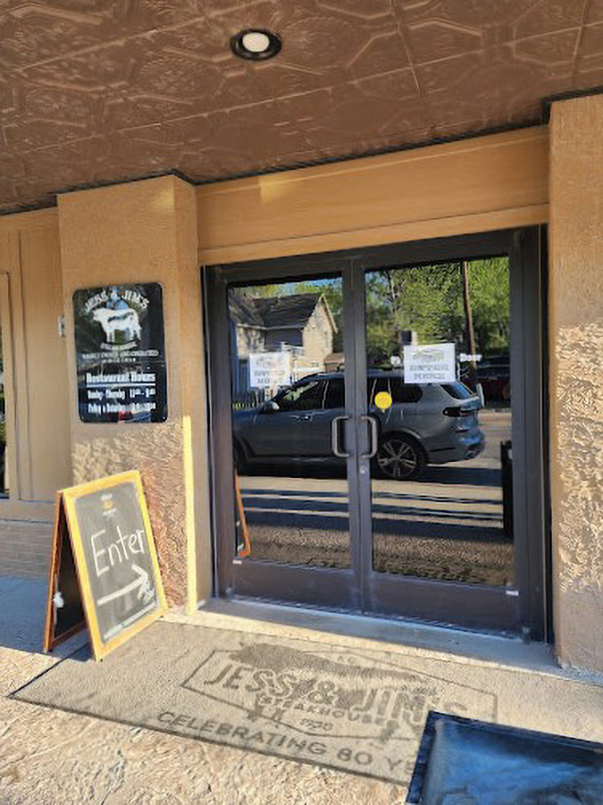 The entrance mat celebrates 80 years of steak mastery – a threshold between ordinary hunger and extraordinary satisfaction.