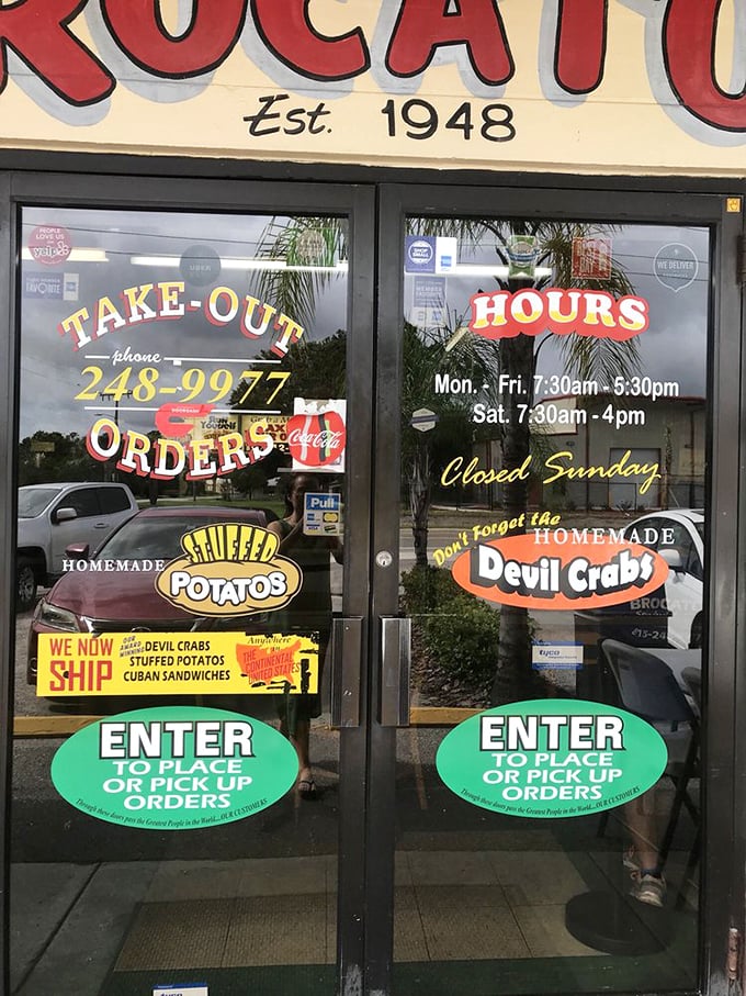The entrance doors tell you everything you need to know: homemade specialties await inside. These glass portals have welcomed food pilgrims for decades.