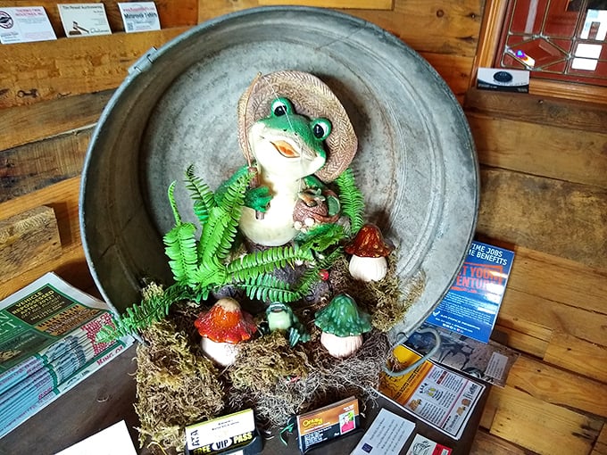 The whimsical toad mascot greets visitors with a tip of his hat. He knows what smoky treasures await you inside.
