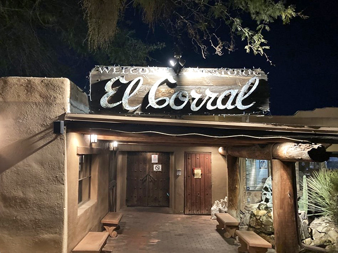 Night transforms the entrance into something magical—like the gateway to a carnivore's Narnia where it's always dinner time.