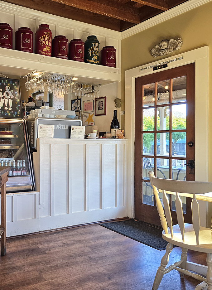 Tea canisters line the shelves above a counter that's seen thousands of "good mornings" exchanged over steaming cups of coffee.