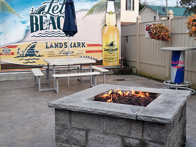 The fire pit patio where "I should get going" turns into "maybe just one more story." Summer nights were made for exactly this. 