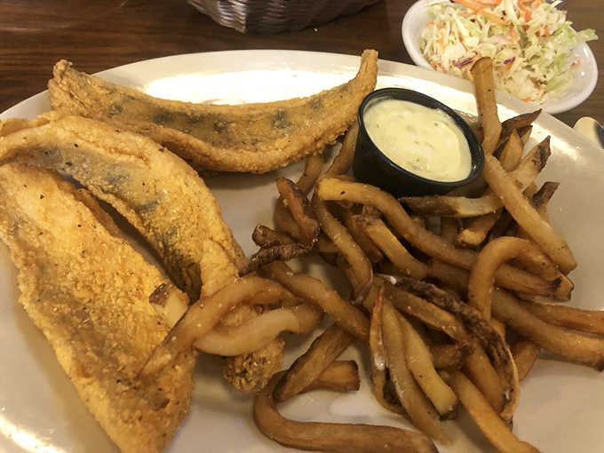 Cornmeal-crusted fish so crispy it practically sings when you cut into it. Paired with hand-cut fries that could make a Frenchman weep with joy.