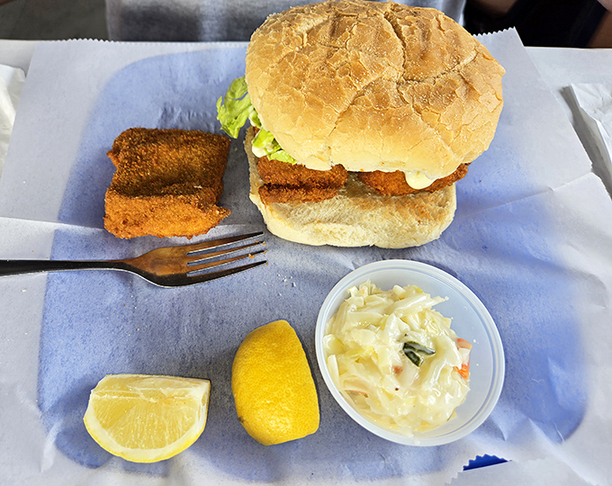 A fish sandwich that means business&mdash;crispy fillet, fresh roll, and all the fixings. Proof that sometimes the best seafood comes between bread.