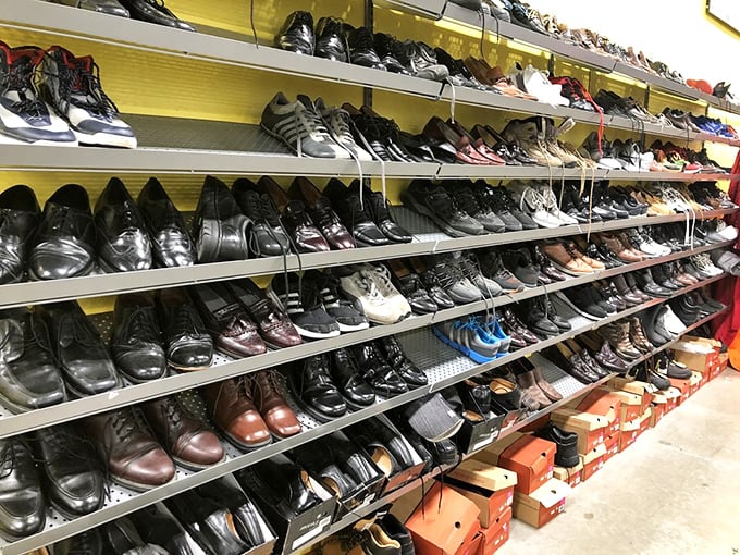 The shoe section: a leather landscape where barely-worn wingtips neighbor with pristine sneakers. Footwear purgatory becomes your closet's salvation.