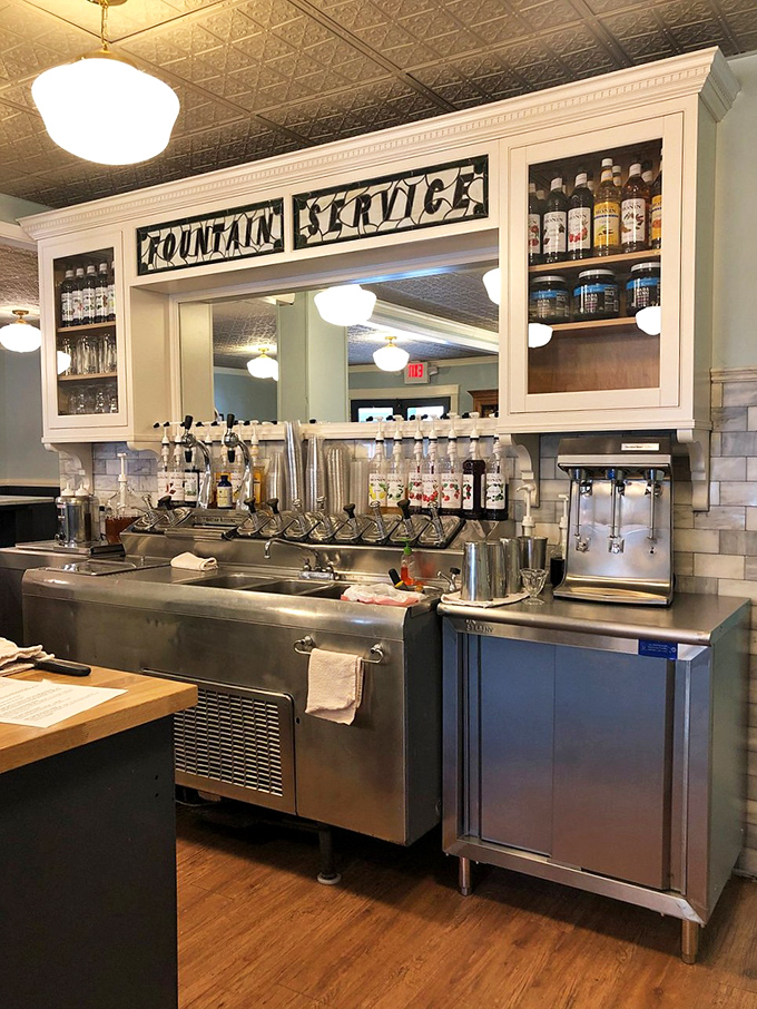 The fountain service station&mdash;laboratory of liquid happiness where physics and flavor combine. Those syrup dispensers have probably witnessed more first dates than any matchmaker.