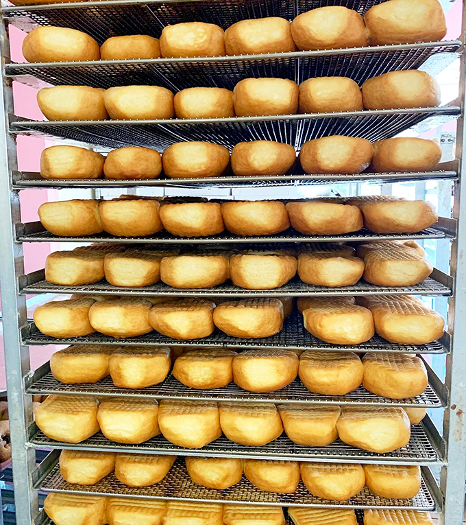 Golden-brown perfection, lined up like soldiers in a delicious army. These fresh recruits won't last long once the doors open.
