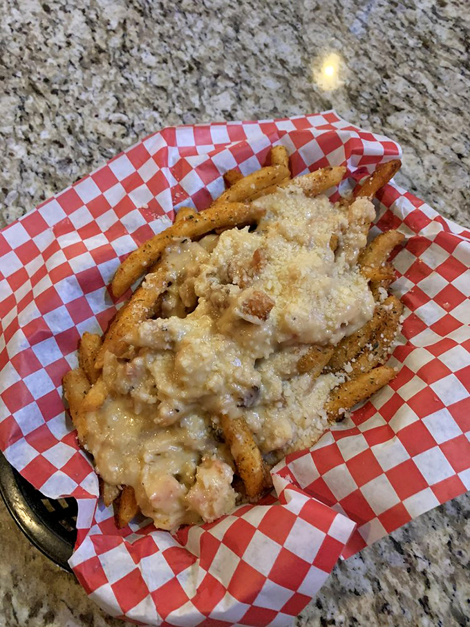 Loaded fries that don't just cross the line between appetizer and main course&mdash;they erase it completely with cheesy, savory abandon.