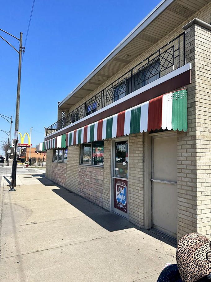 That iconic striped awning isn't just weather protection&mdash;it's a landmark that's guided hungry Chicagoans home for generations.