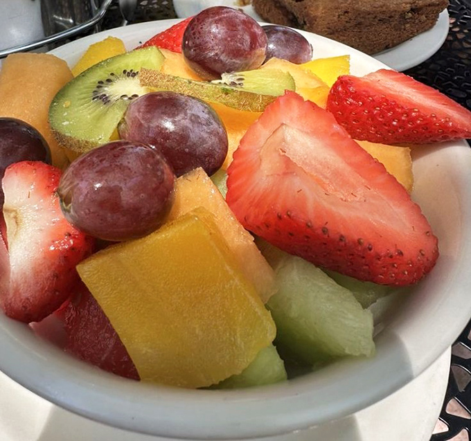 A fruit bowl that doesn't just check the "healthy option" box&mdash;it celebrates it with vibrant colors and freshness that makes you feel virtuous and indulgent simultaneously. 