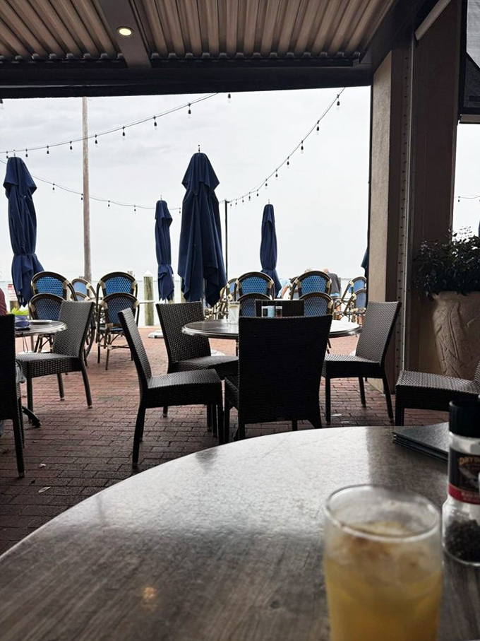 Outdoor seating where the Gulf breeze does double duty as both air conditioning and appetite enhancer.