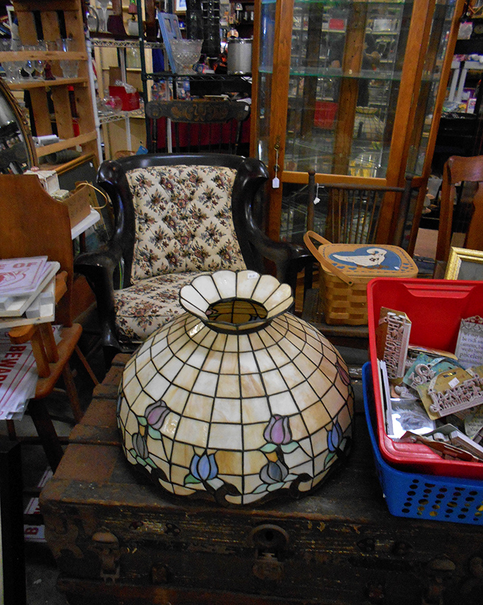 That Tiffany-style lamp shade isn't just lighting—it's functional art that survived decades to become the conversation piece your living room needs.