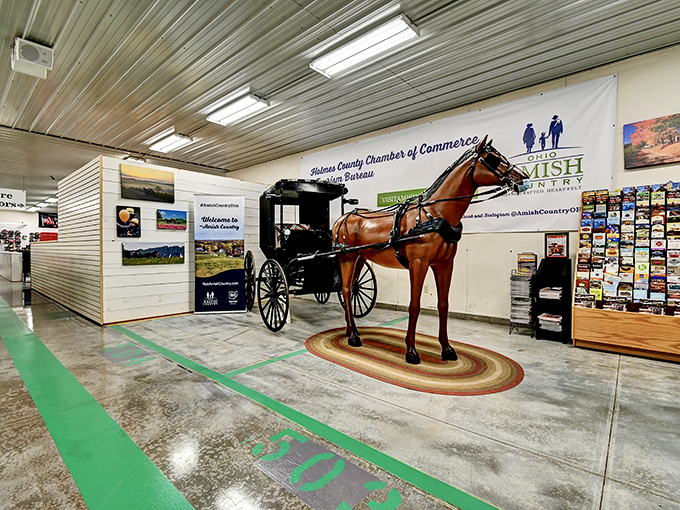 The life-sized horse and buggy display serves as both a photo opportunity and a reminder of the area's cultural heritage.