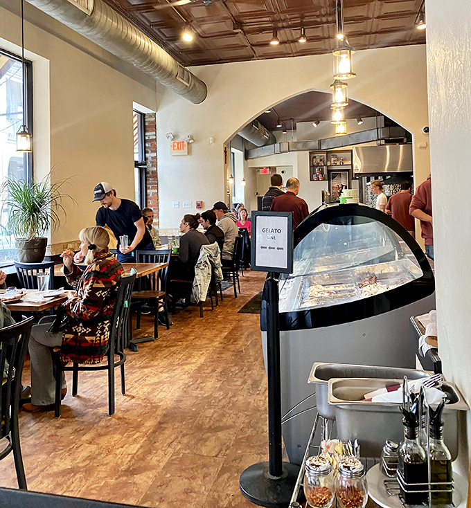 Where pizza memories are made. The cozy interior invites you to linger over one more bite, one more sip, one more moment of Italian bliss.